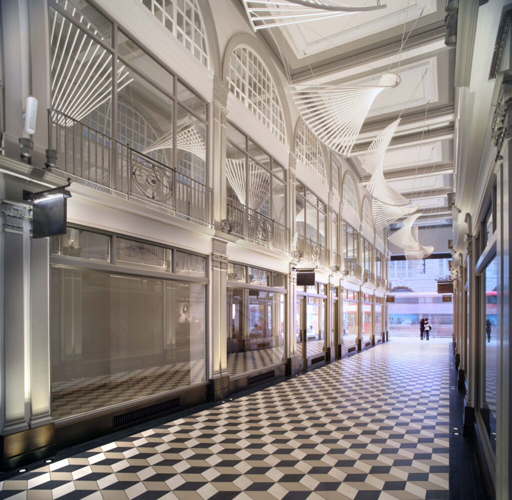 Quadrant Arcade - In Opera Group - Terrazzo, Stone & Porcelain Finishes