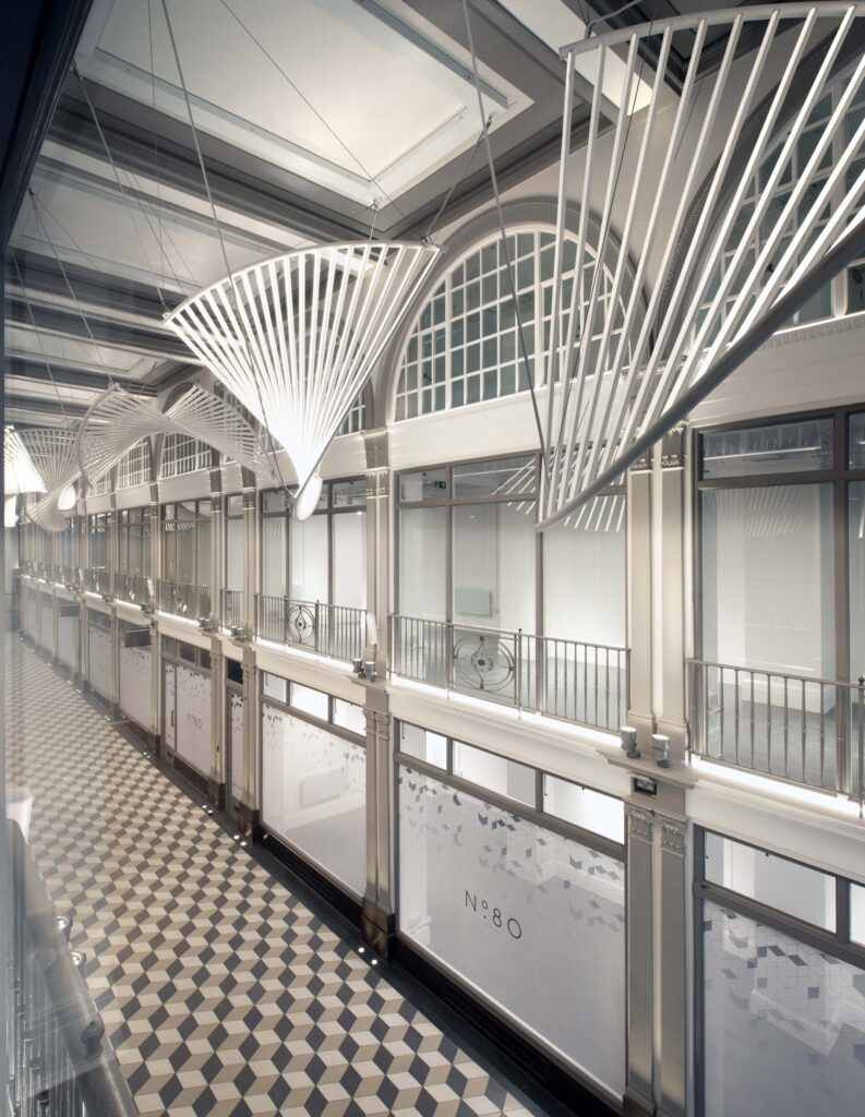 Quadrant Arcade - In Opera Group - Terrazzo, Stone & Porcelain Finishes