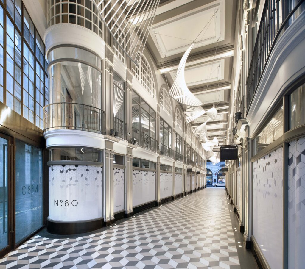 Quadrant Arcade - In Opera Group - Terrazzo, Stone & Porcelain Finishes